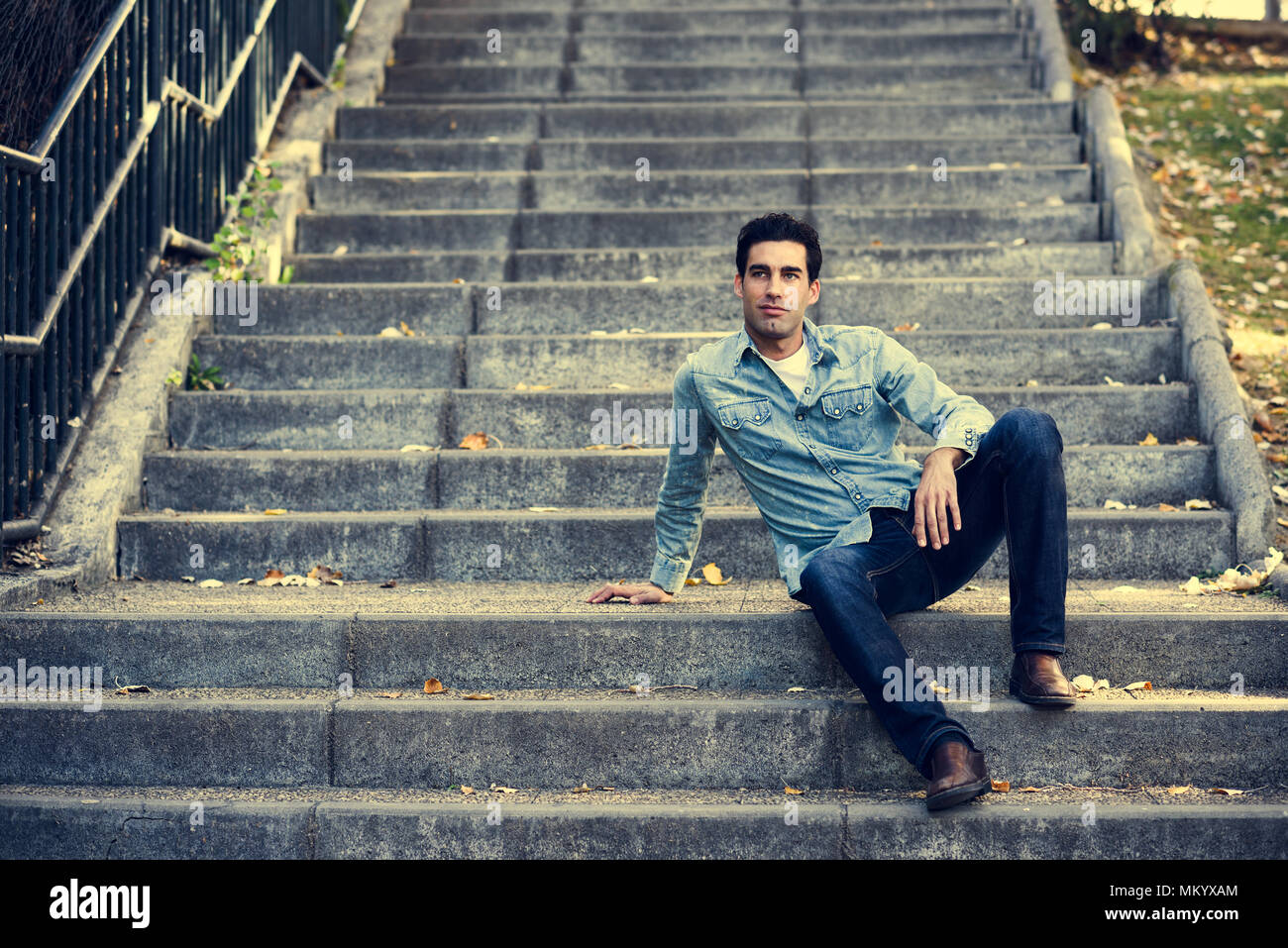 Portrait of a young handsome man, model of fashion, with formal ...