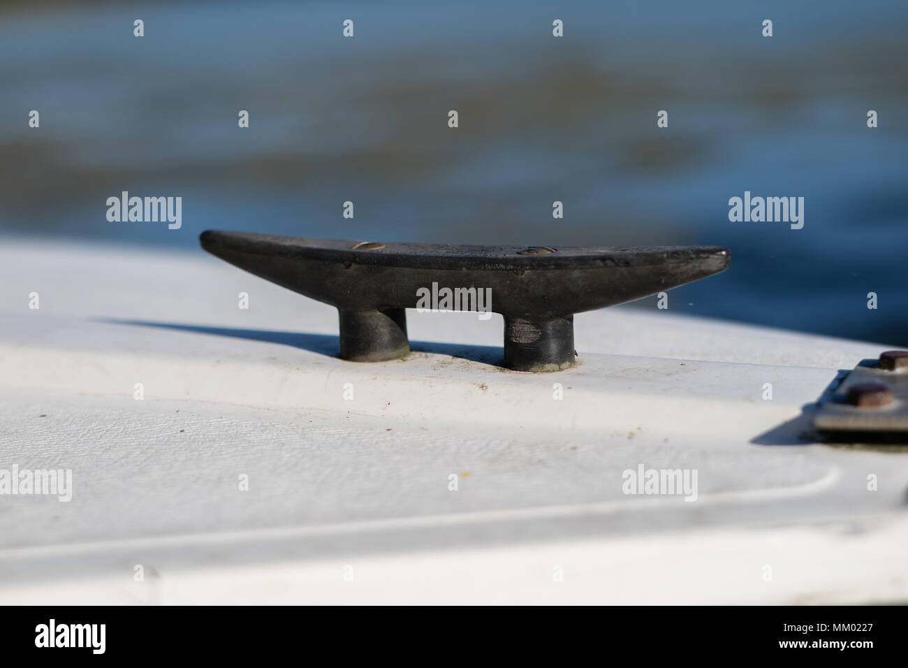 Cleat for mooring. Fastening for mooring ropes on a boat. Season of the ...