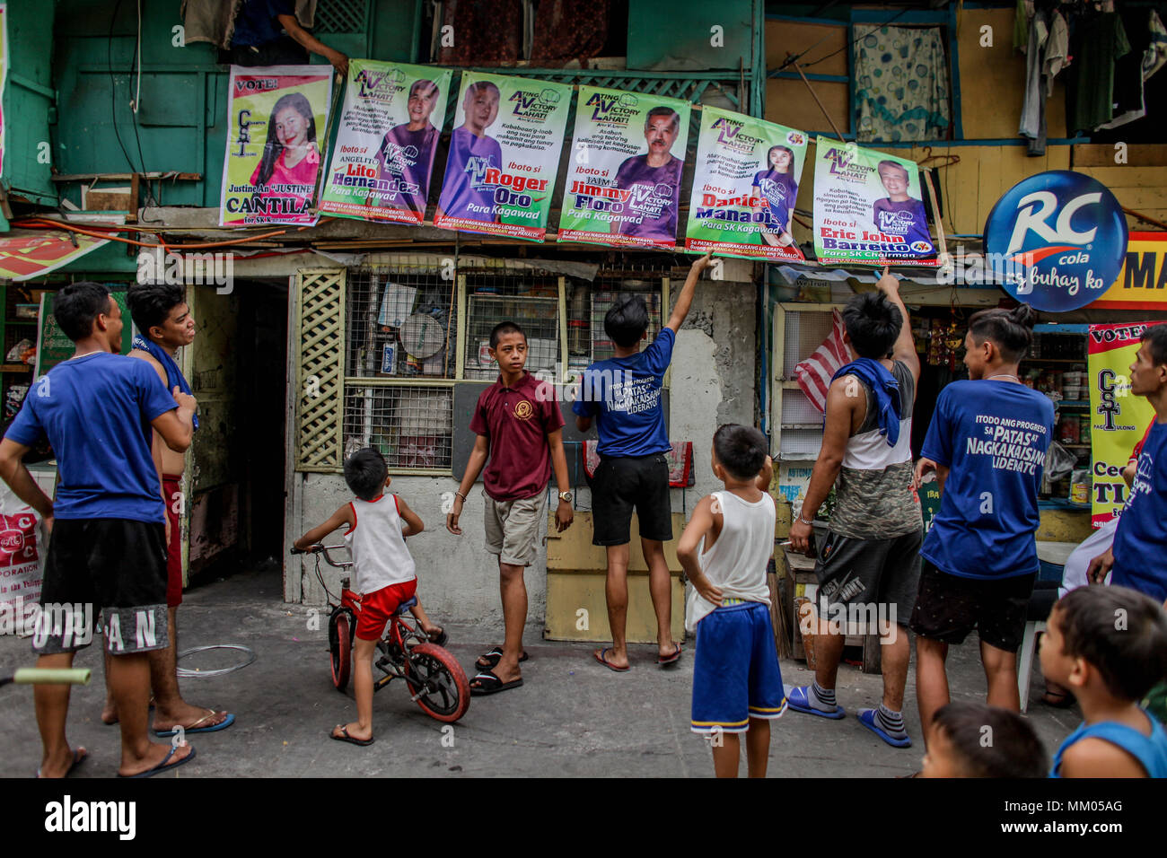 May 9, 2018 - Philippines - Election volunteers set up campaign posters ...