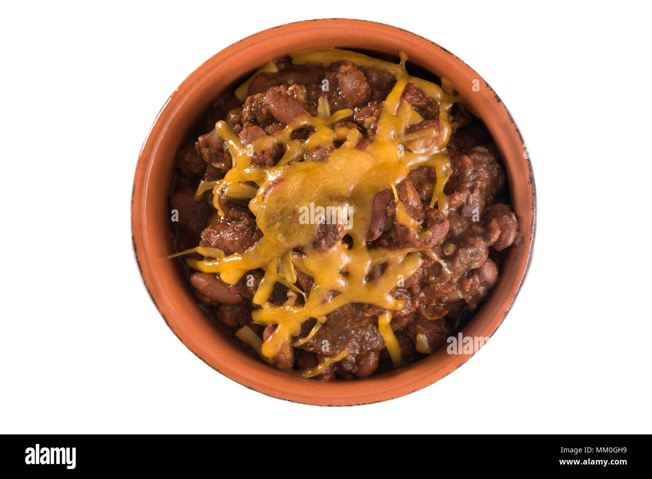 spicy Beef and Bean Chili with cheddar cheese, on white, with copy ...