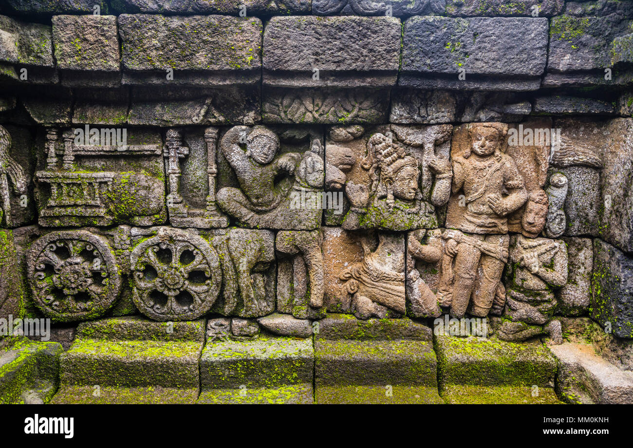 relief panels on the 4th balustrade of 9th century Borobudur Buddhist ...