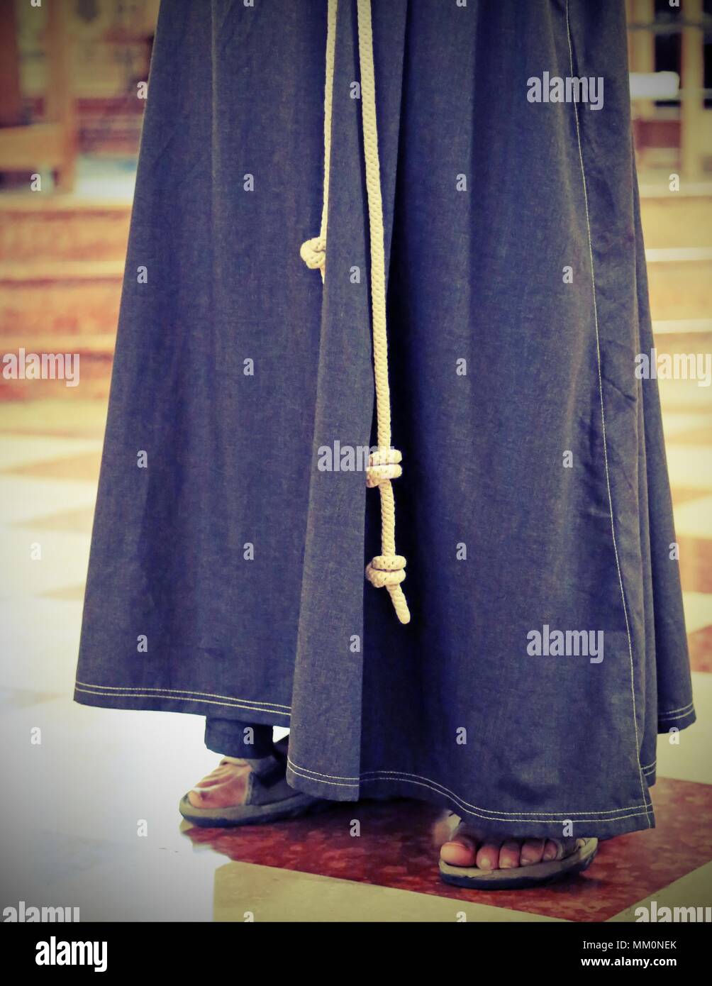 barefoot franciscan monk with sandals with string in the church with ...