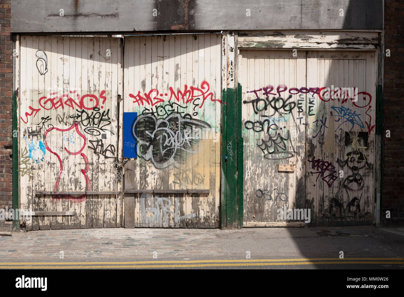 Heavily graffitied gates, French Place, London, EC2 Stock Photo - Alamy
