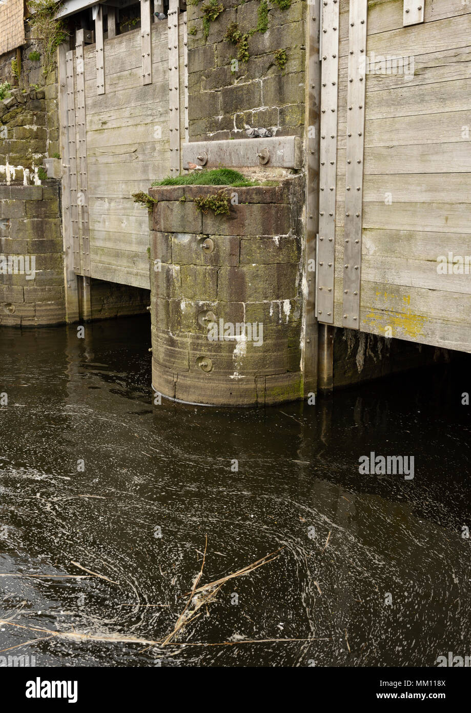 Sluice gates, flood defences, Pwllheli north wales uk Stock Photo - Alamy