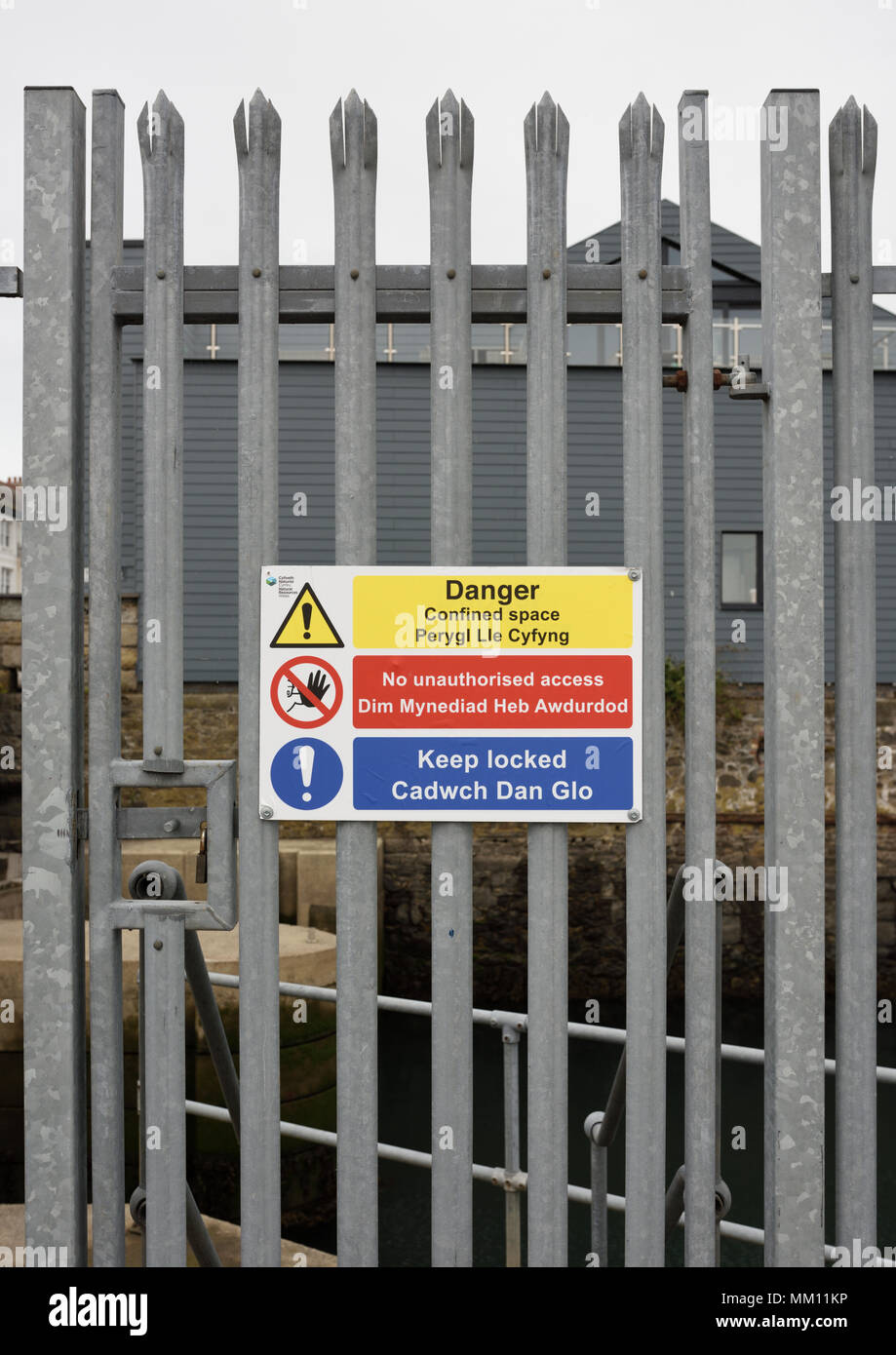 danger confined area risk warning sign bilingual welsh and english on ...