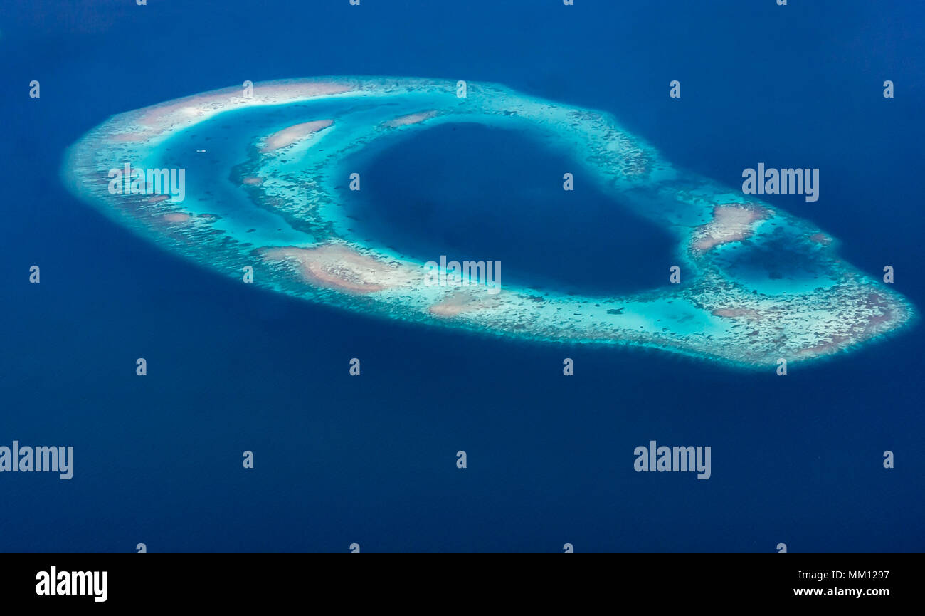 Aerial view of an atoll in the Maldives, Indian Ocean Stock Photo - Alamy