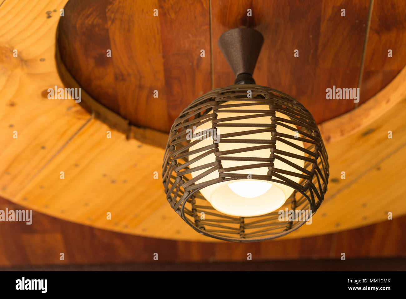 Vintage light bulb hang on wood roof Stock Photo - Alamy