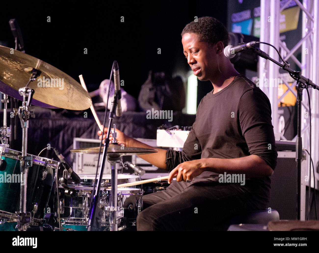 Moses boyd playing drums hi-res stock photography and images - Alamy