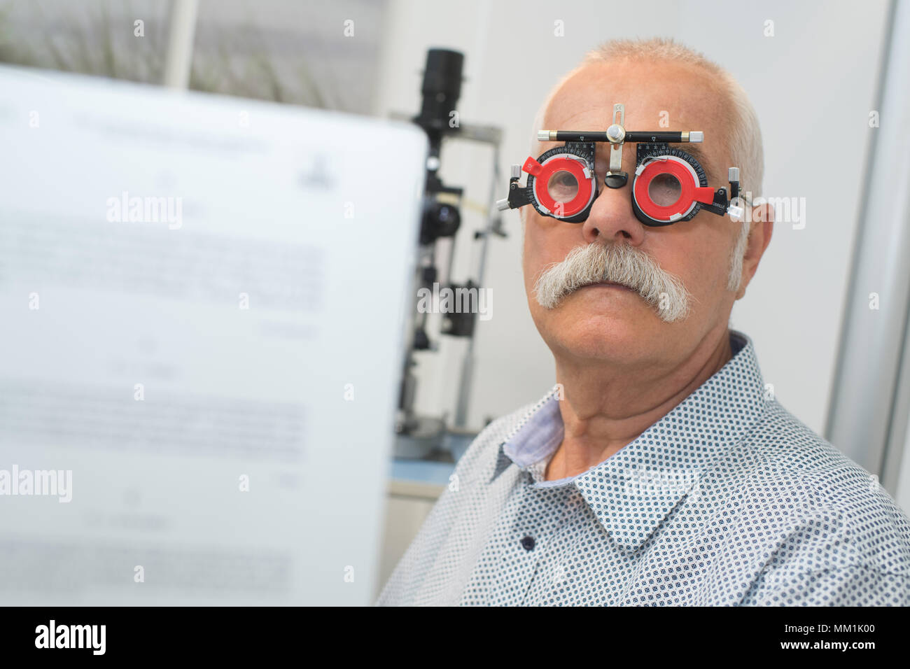 Old man eye test hi-res stock photography and images - Alamy