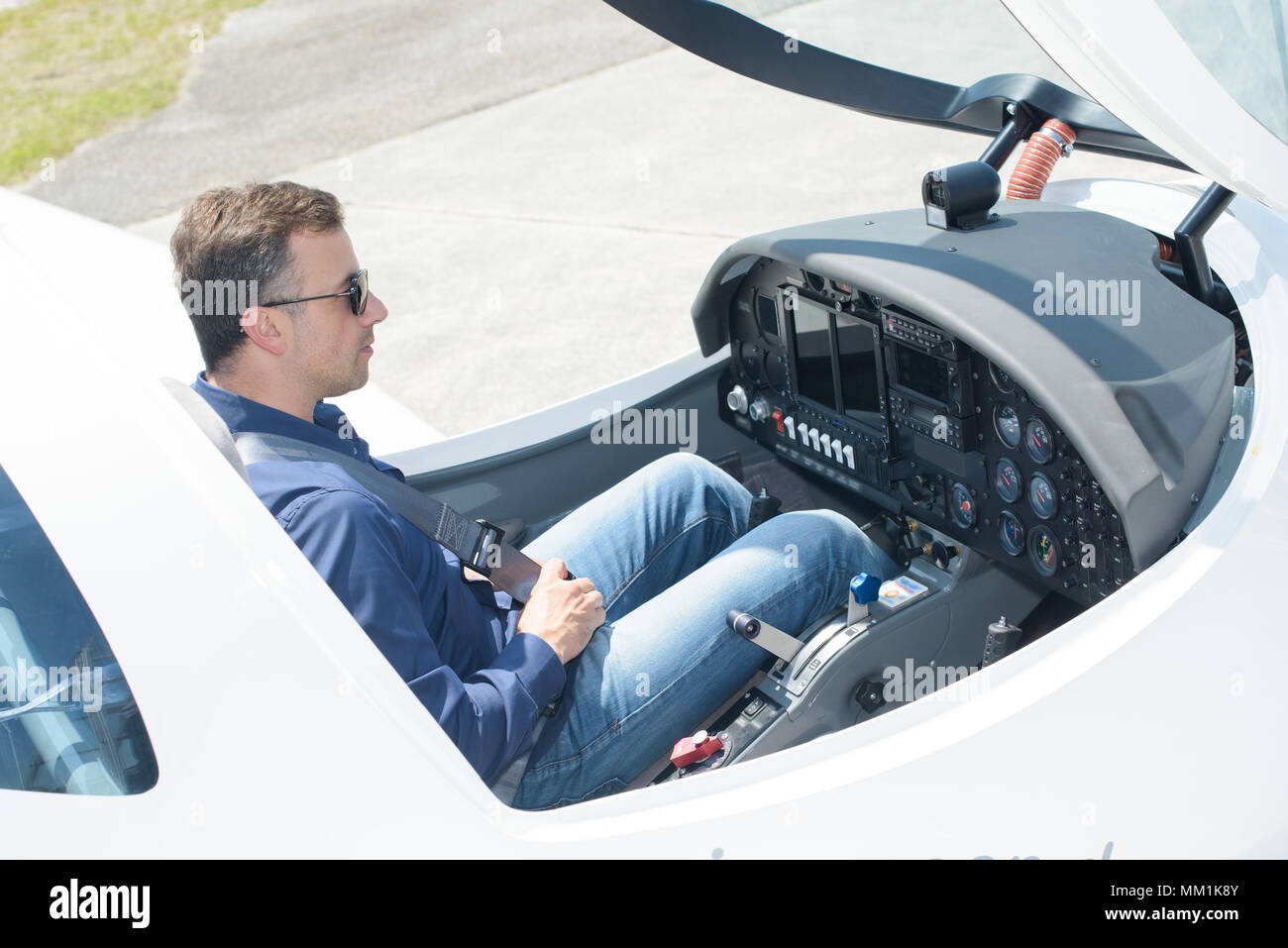 man inside a cockpit Stock Photo - Alamy