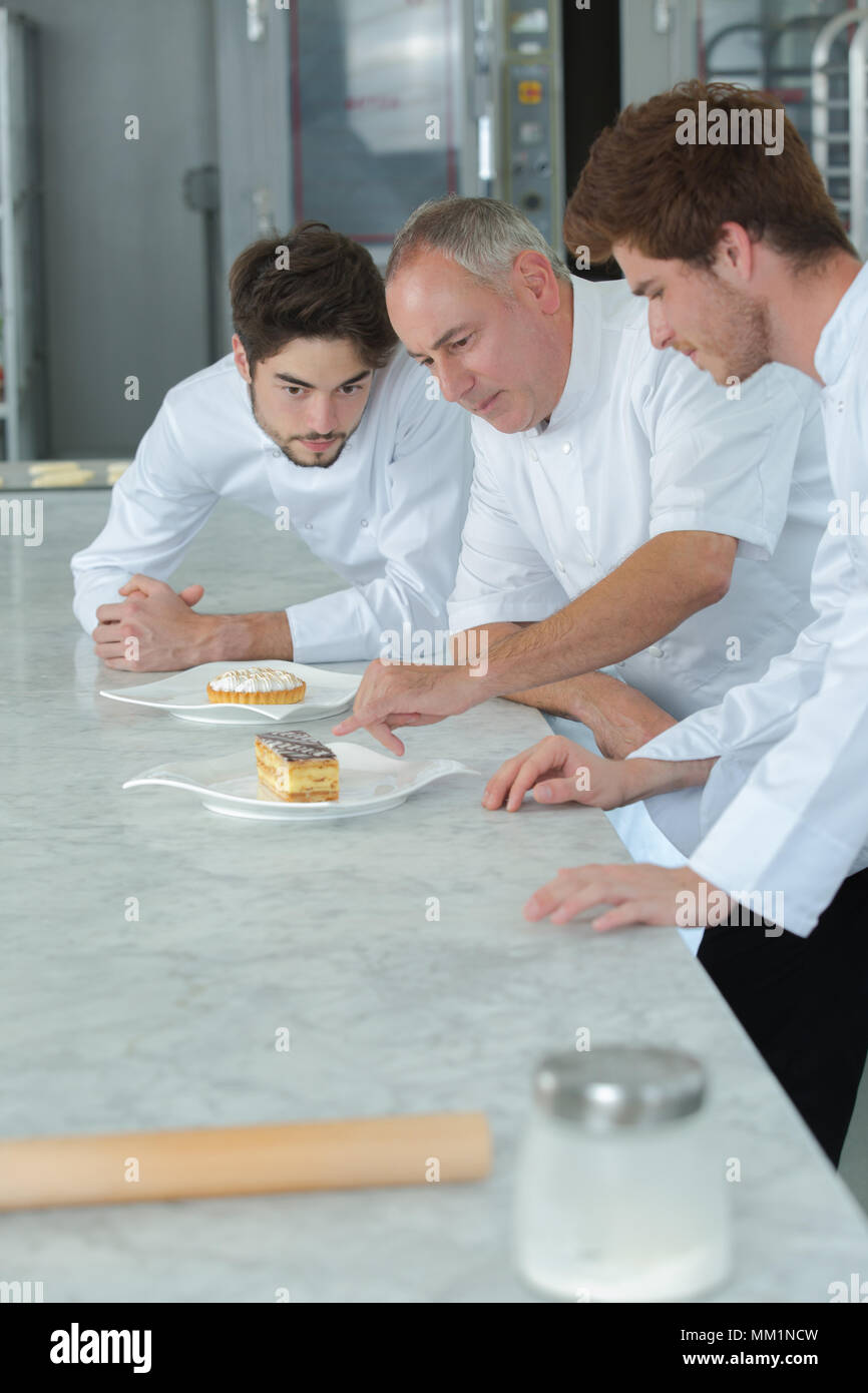Young baker assistant hi-res stock photography and images - Alamy