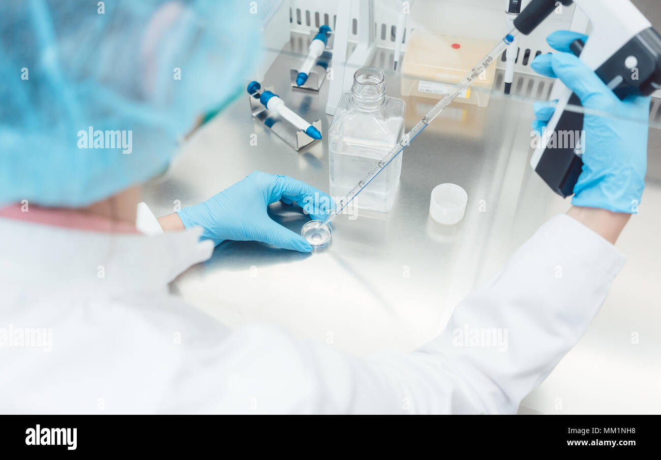 Scientist conducting an experiment hi-res stock photography and images ...