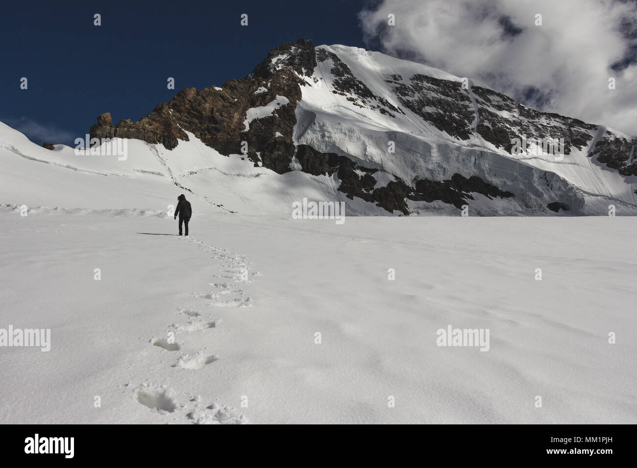 Follow footprints hi-res stock photography and images - Alamy