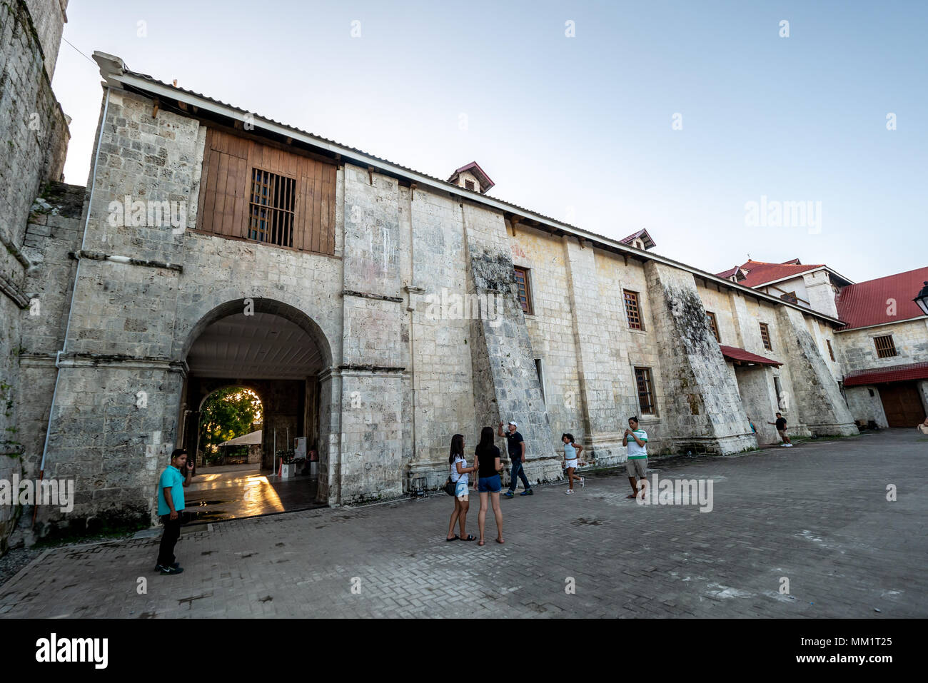 Bohol island, Philippines. Apr 23, 2018: Tourists taking commemorative photos at Baclayon church ...