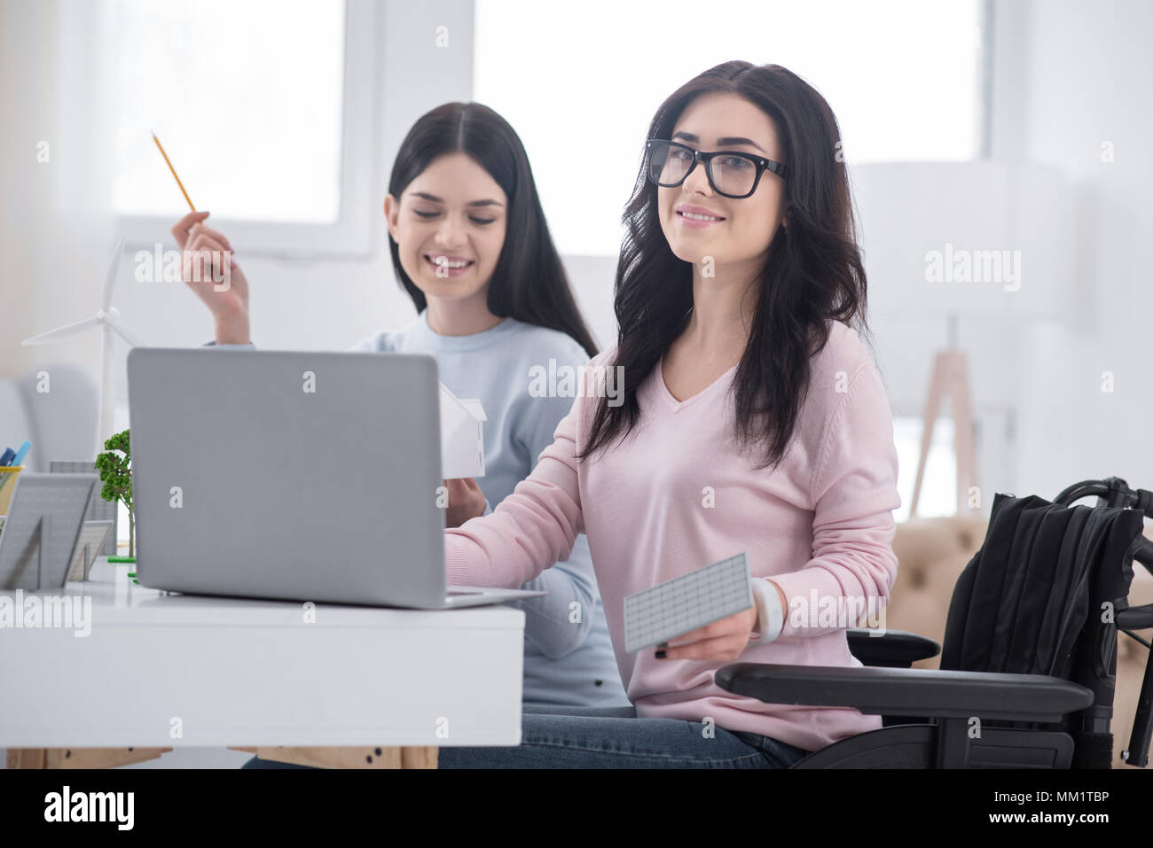 Pleasant female students preparing project Stock Photo - Alamy