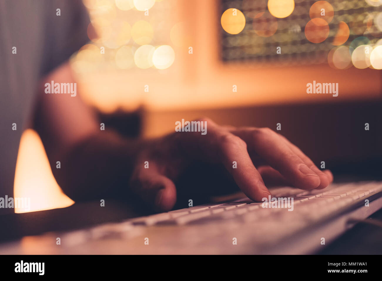 Finger on computer keyboard. Man typing desktop pc keys in home office ...