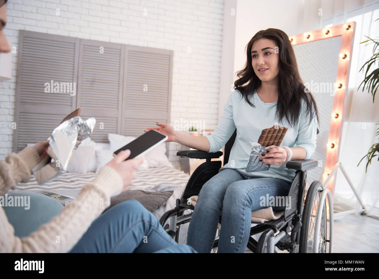 Beautiful two friends enjoying chocolate Stock Photo - Alamy
