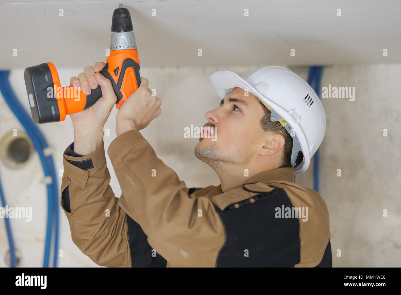 Drilling plasterboard hi-res stock photography and images - Alamy