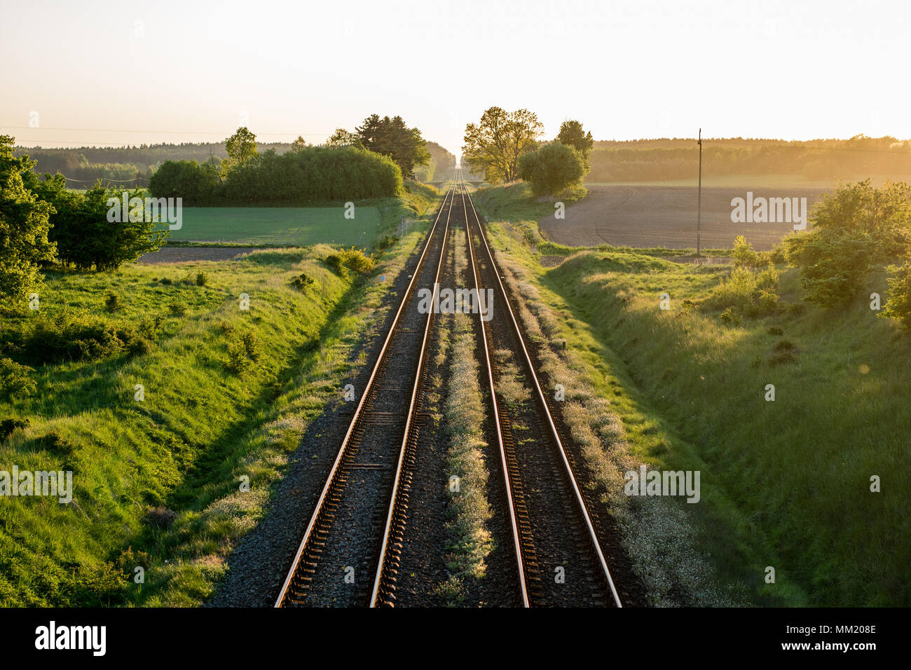 Railway tracks seen from the railway viaduct. The railway line with two ...