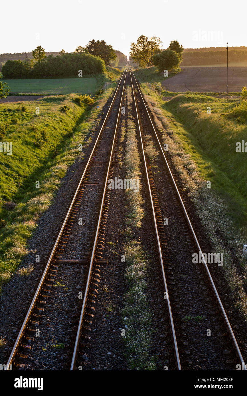 Railway tracks seen from the railway viaduct. The railway line with two ...