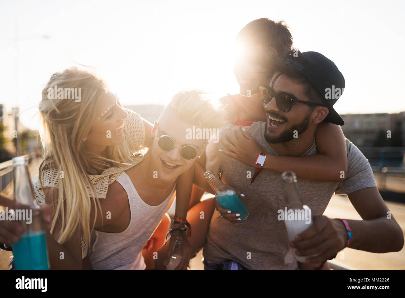Group of young friends having fun together Stock Photo - Alamy