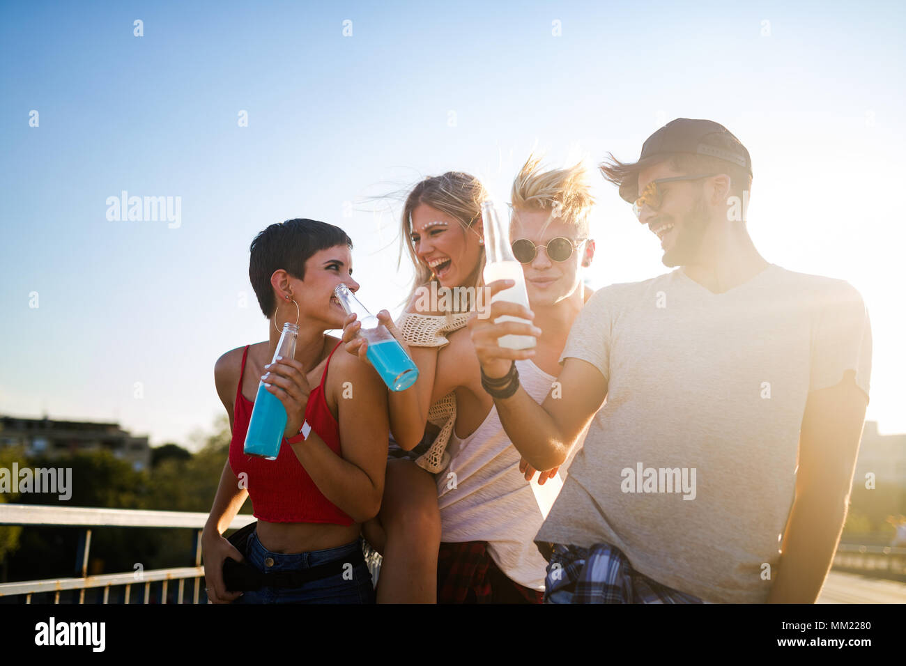 Group of young friends having fun together Stock Photo - Alamy