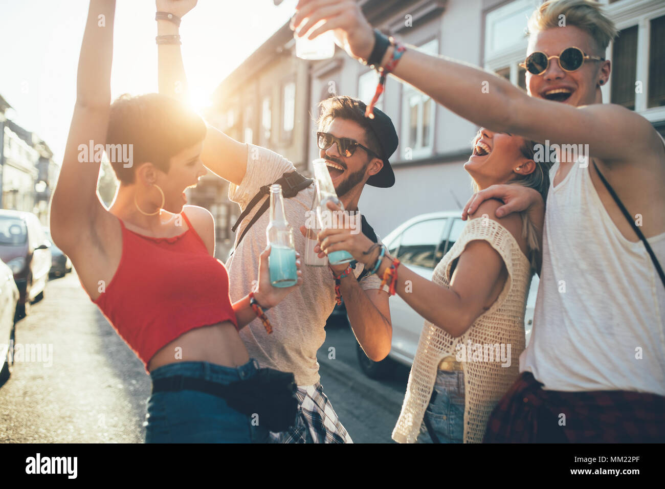 Group of young friends having fun together Stock Photo - Alamy