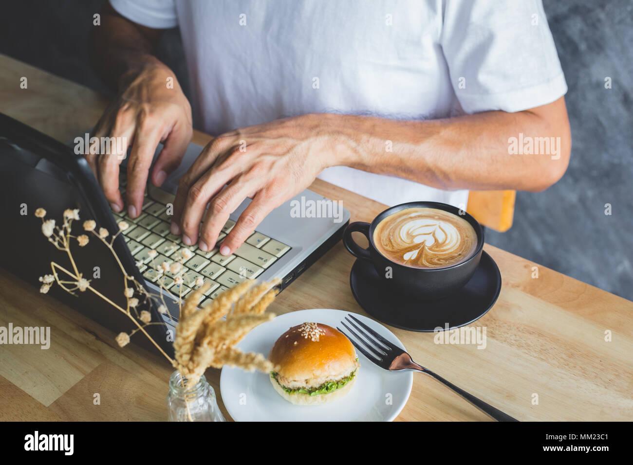 Man pressing notebook laptop computer hi-res stock photography and ...