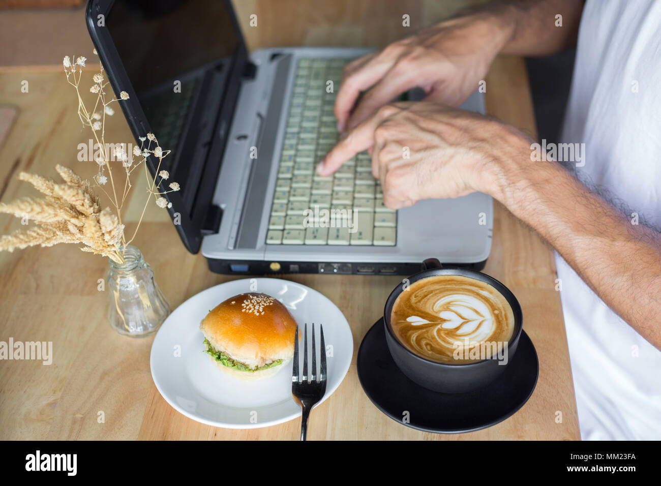 Man pressing notebook laptop computer hi-res stock photography and ...