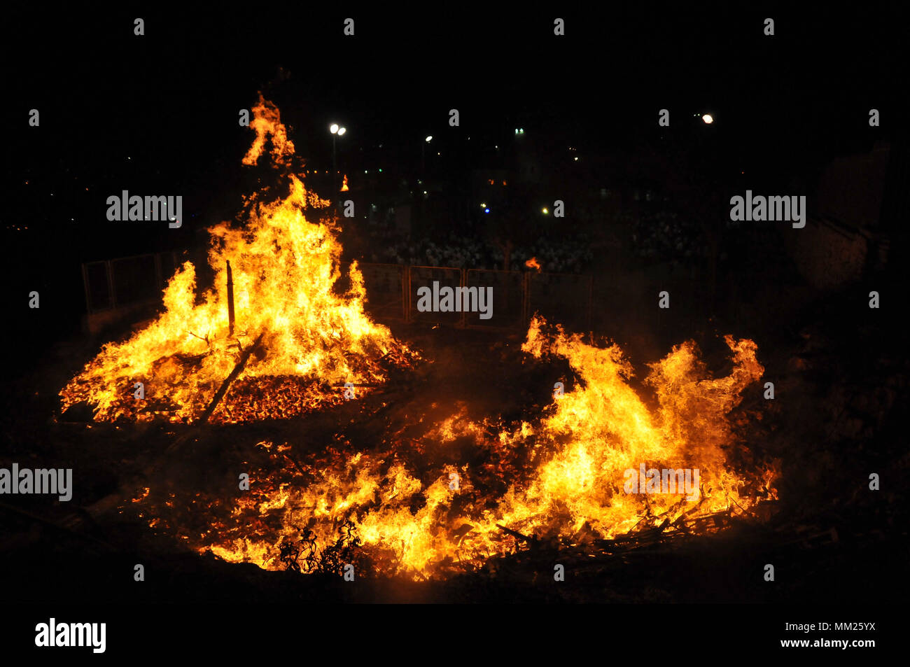 Celebrating the Jewish holiday of Lag Baomer with a bonfire Stock Photo ...