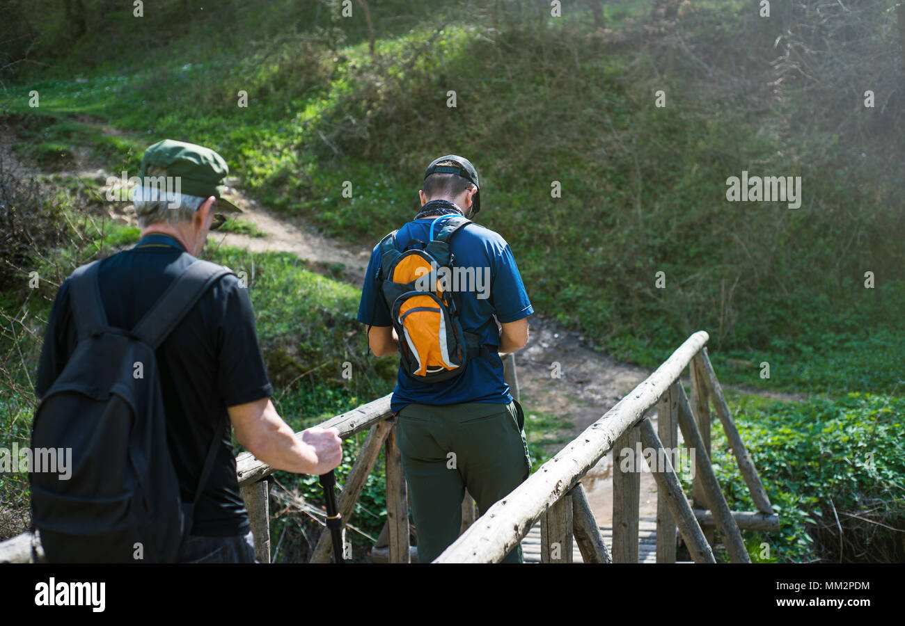 Two people crossing hi-res stock photography and images - Alamy