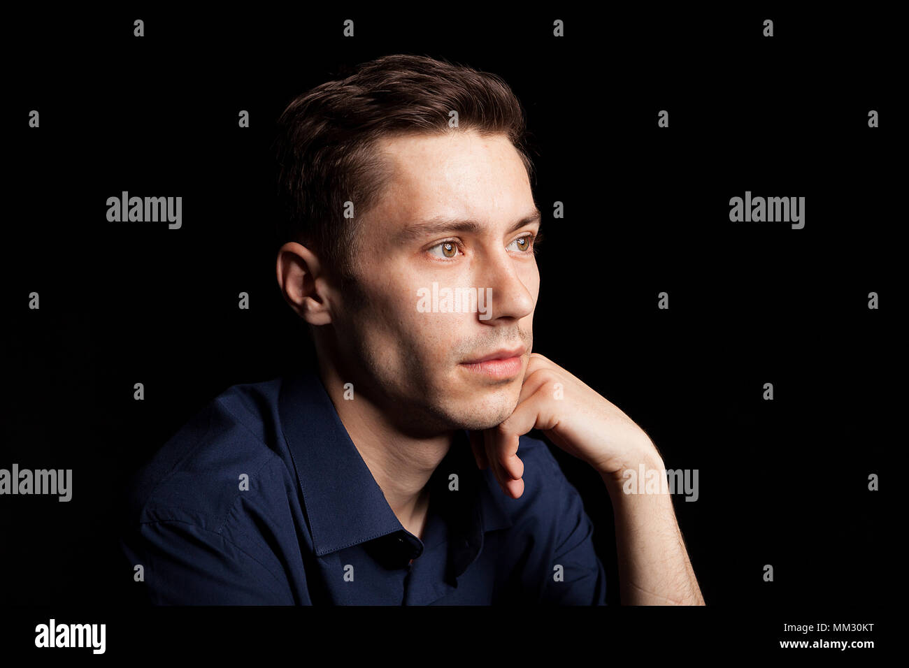 Portrait with fashion lighting of young man Stock Photo - Alamy