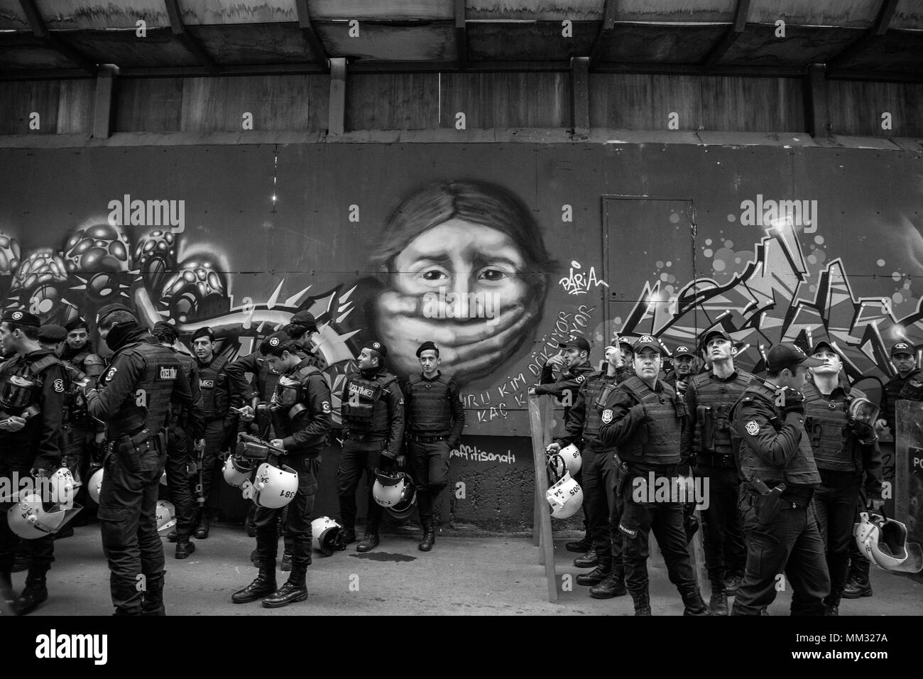 Police forces in Istiklal street and a graffiti on wall Stock Photo - Alamy