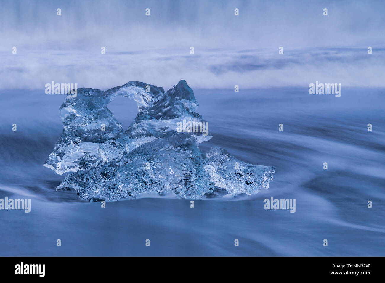 Natural ice sculpture on the Diamond Black Sand Beach at Jokulsarlon ...