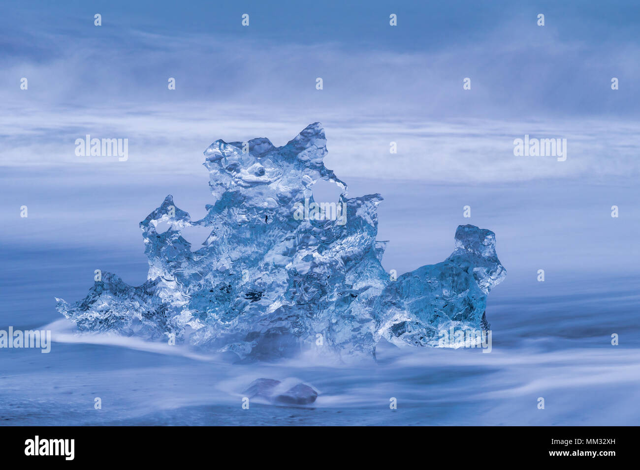 Natural ice sculpture on the Diamond Black Sand Beach at Jokulsarlon ...