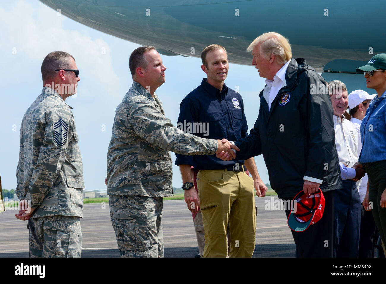President Donald Trump shakes hands with Col. Gary Jones, commander of ...