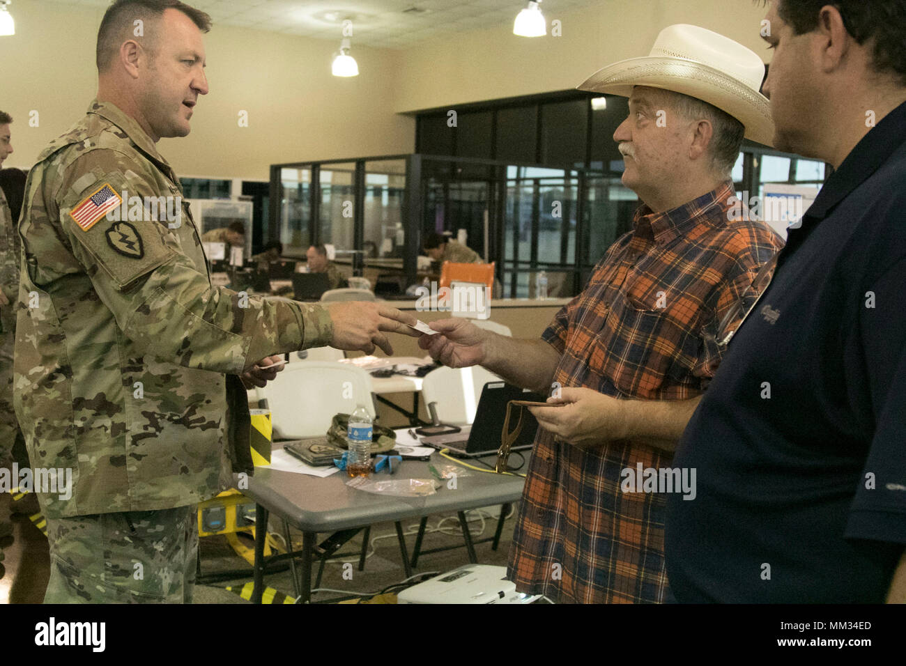 Col. John D. Highfill, Operations Officer for U.S. Army North exchanges ...