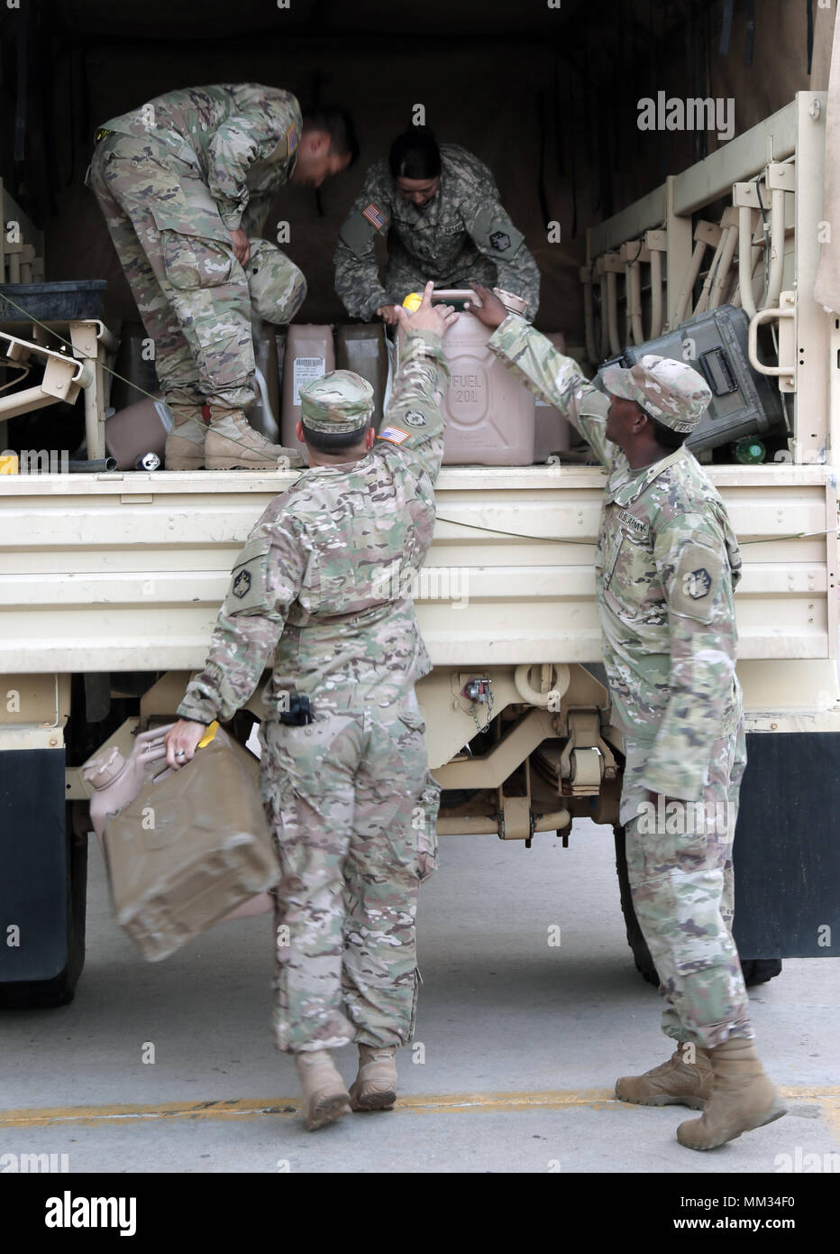 U.S. Soldiers of the 151 Movement Control Team, 49th Transportation ...