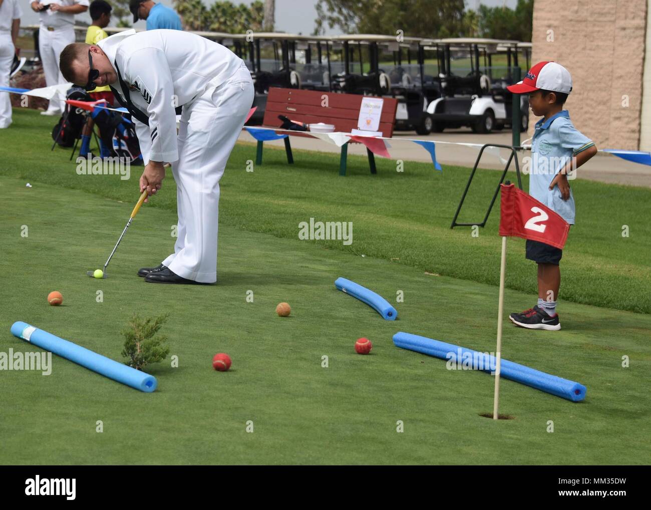 Child golf team hi-res stock photography and images - Alamy