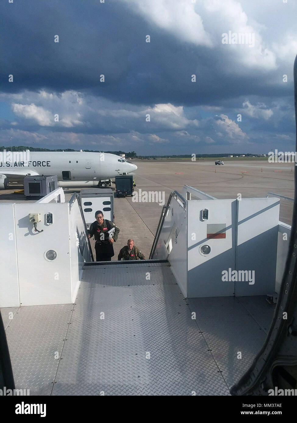 Team JSTARS aircrew personnel board an E-8C Joint STARS in preparation ...