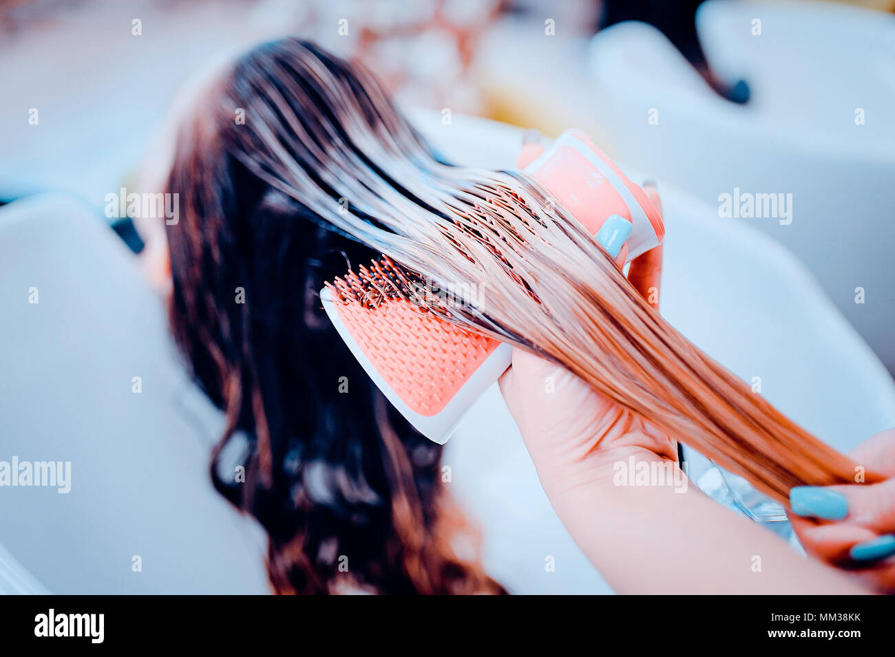 girl in a beauty salon. wash your hair, hair care, health. Toned image ...