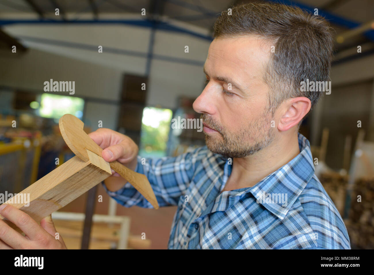 fitting the wood frames Stock Photo - Alamy