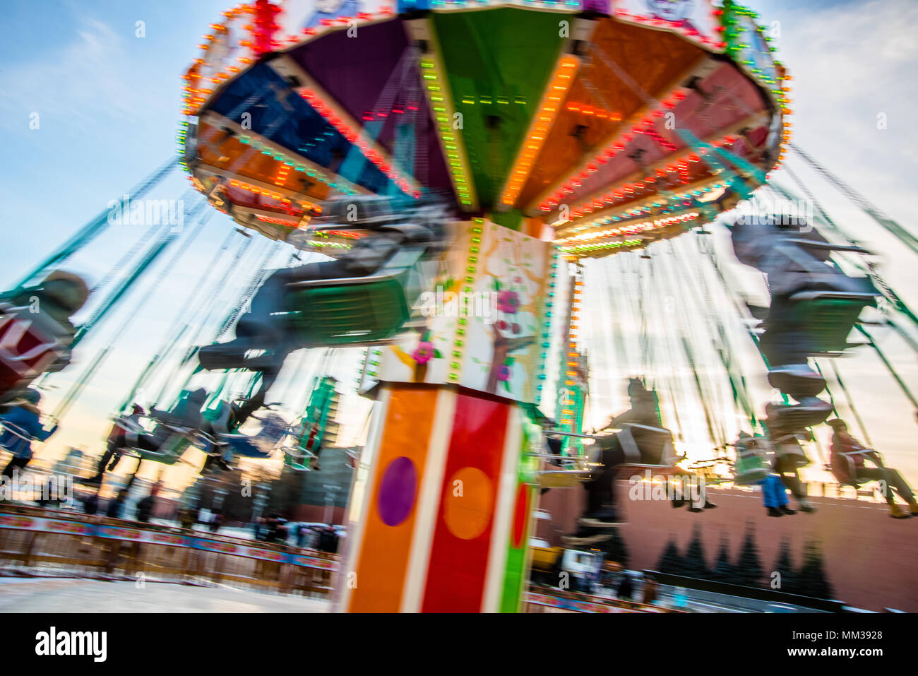 Abstract motion blur carousel spinning with kids, long exposure Stock ...
