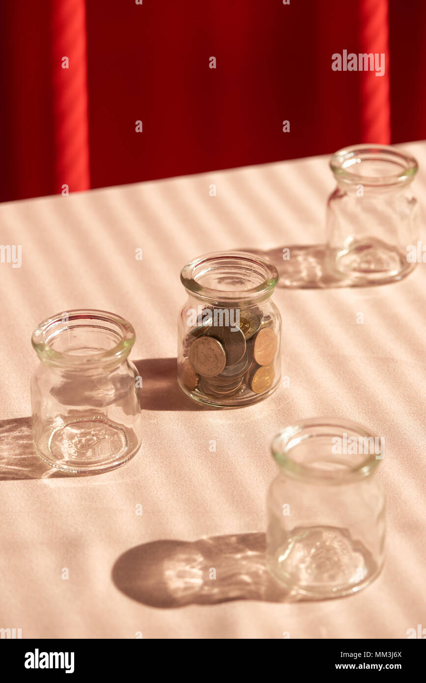 Coins in glass bottle color hi-res stock photography and images - Alamy