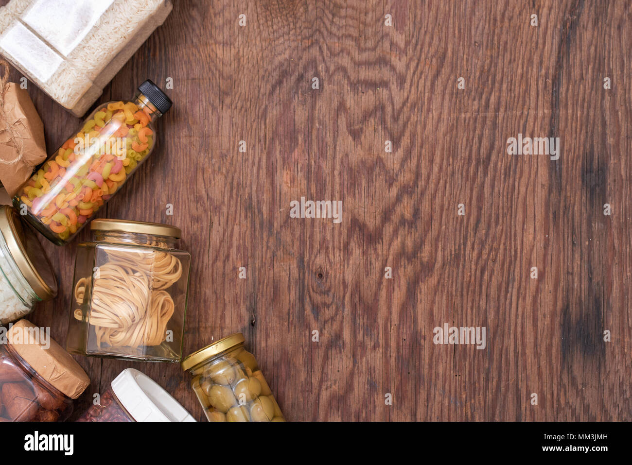 Food donations on wooden background, top view Stock Photo - Alamy