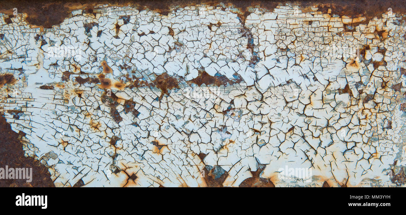 Heavy erosion metal texture faded blue color, abstract grunge background. Weathered rust metal ...