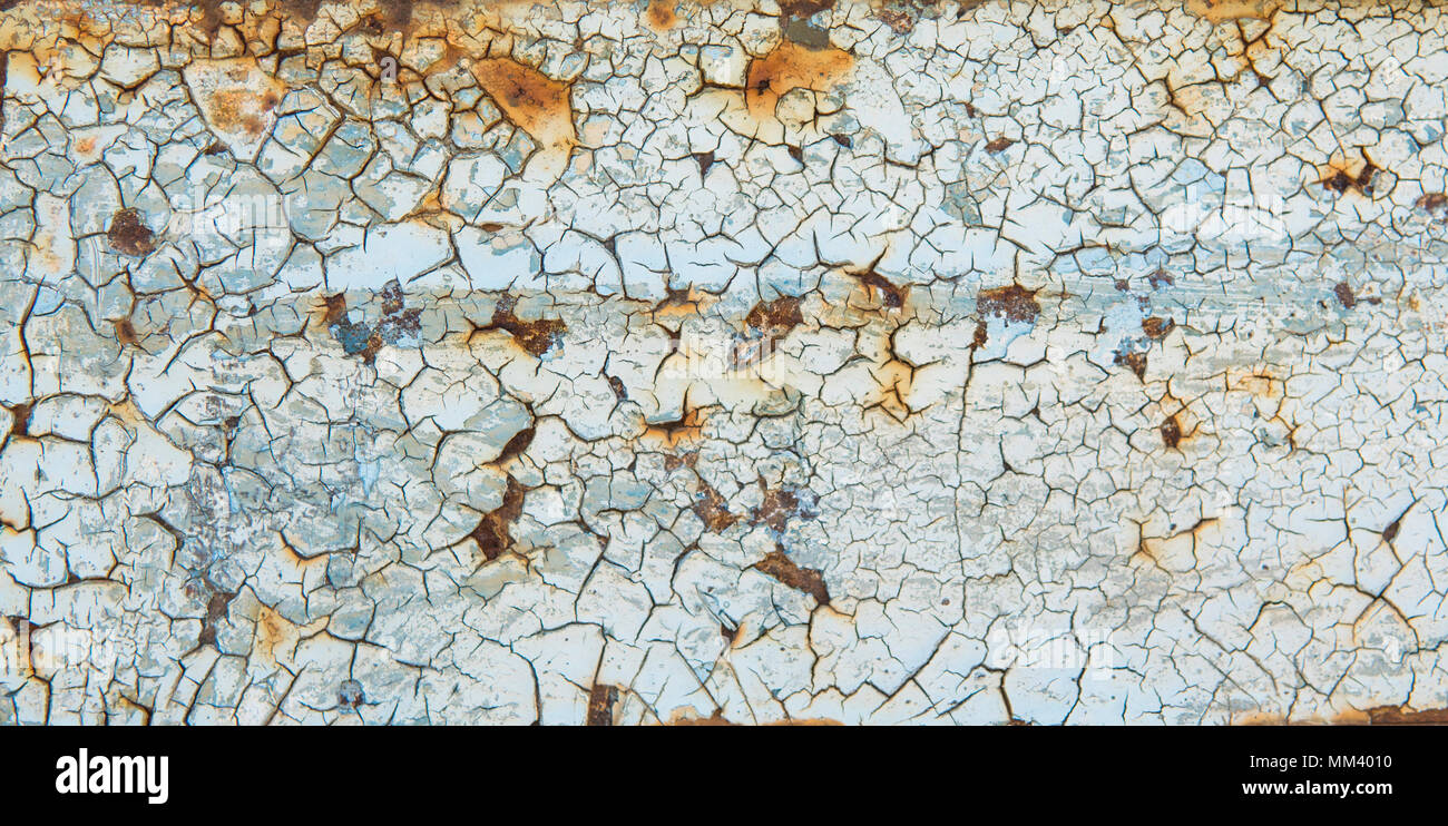 Heavy erosion metal texture faded blue color, abstract grunge background. Weathered rust metal ...