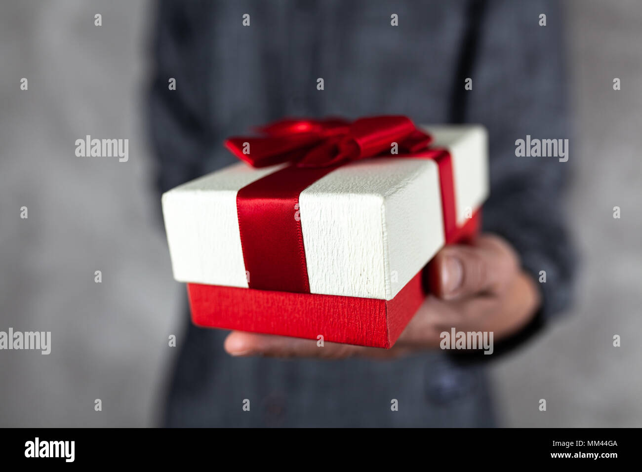 Hands gift boxes hi-res stock photography and images - Alamy