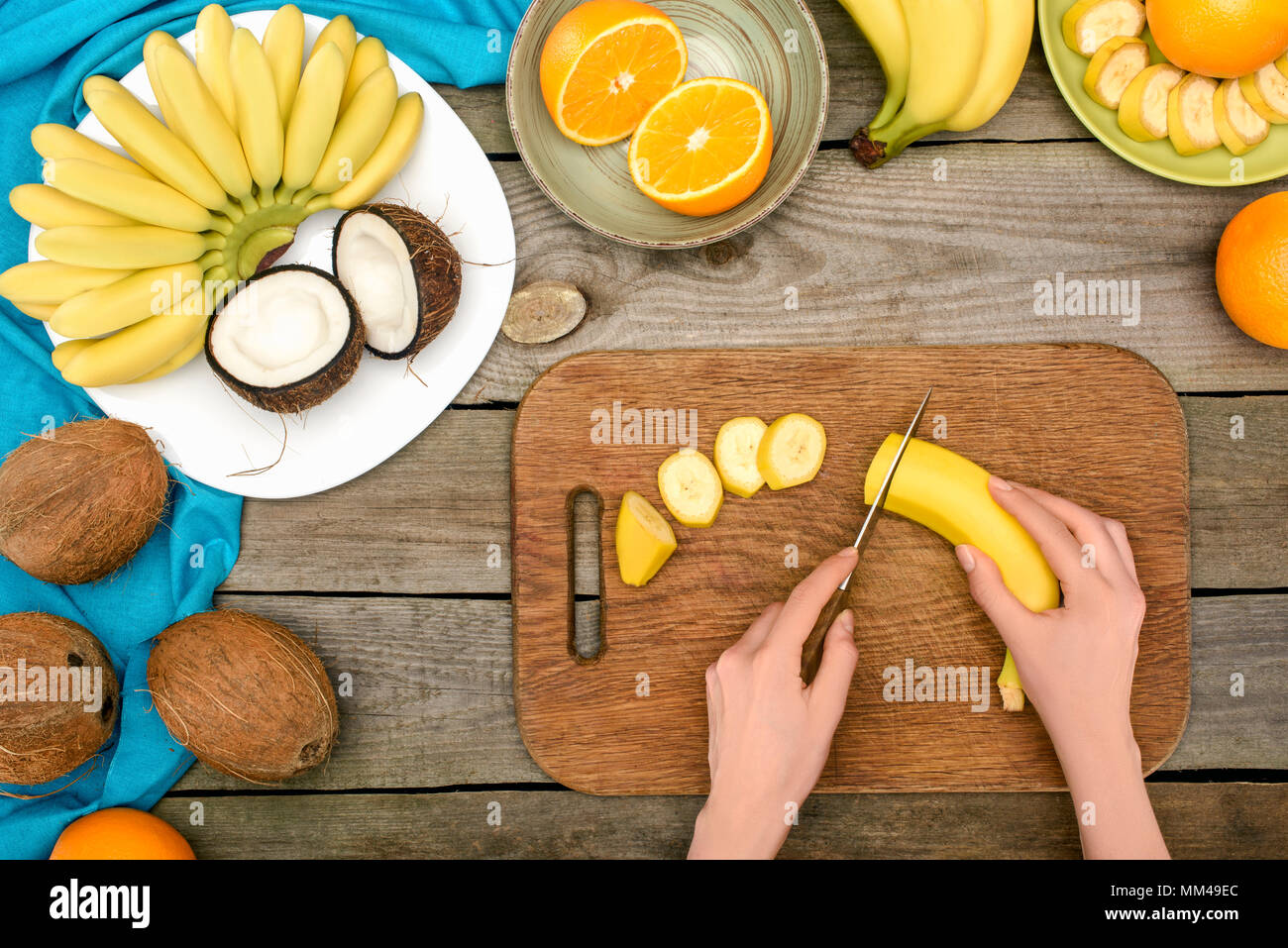 Slicing banana hi-res stock photography and images - Alamy