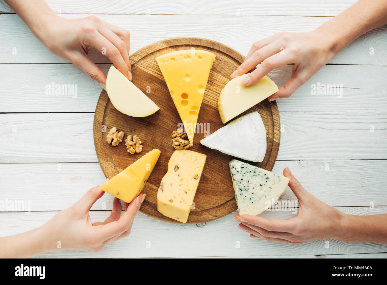 hands holding cheese Stock Photo - Alamy